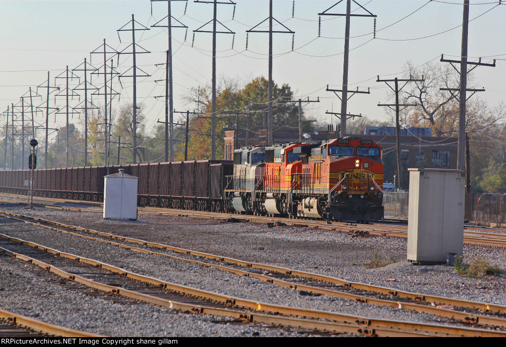 BNVF 5224 Leads a tied down ore train In the Trra outbound yard.